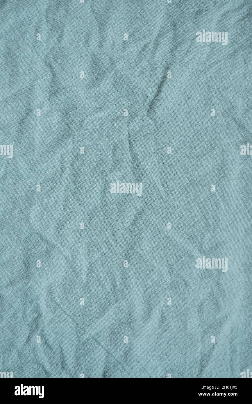 A texture of a linen crumpled green cloth Stock Photo - Alamy