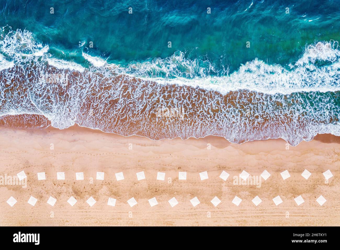 Beach and blue water waves seascape background from aerial top view ...