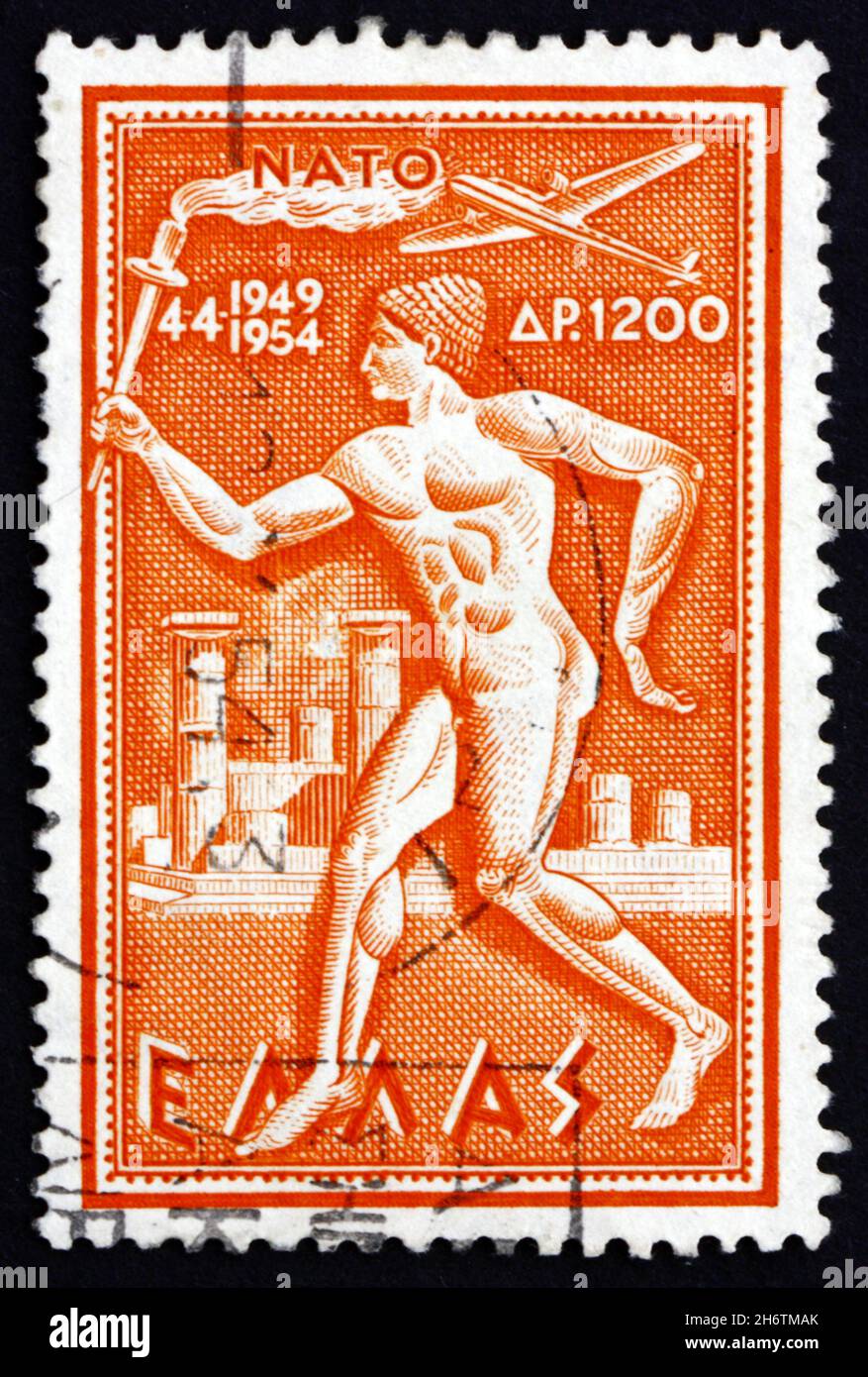 GREECE - CIRCA 1954: a stamp printed in the Greece shows Torchbearer ...