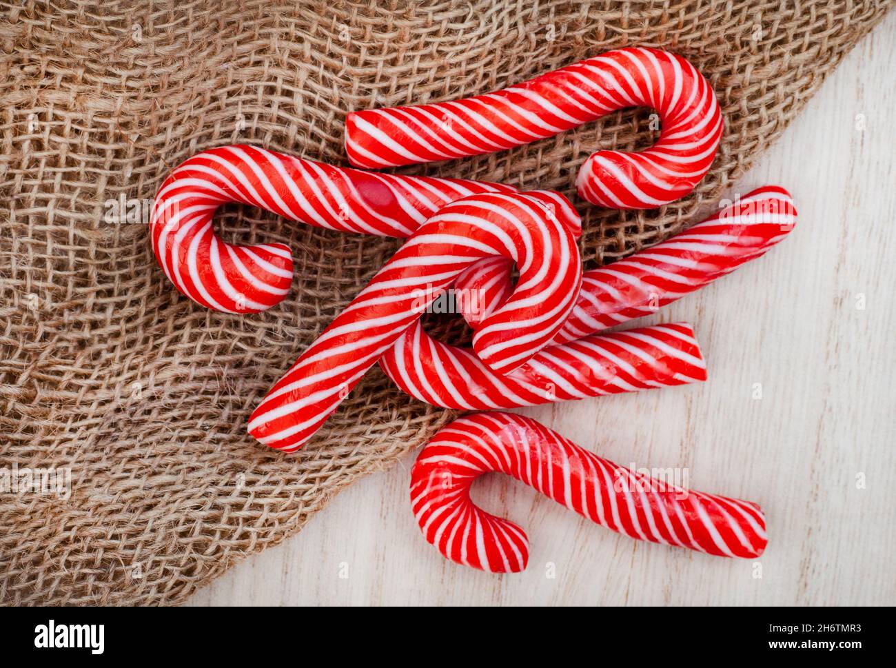 small candy canes and red and white sweets with copy space Stock Photo ...
