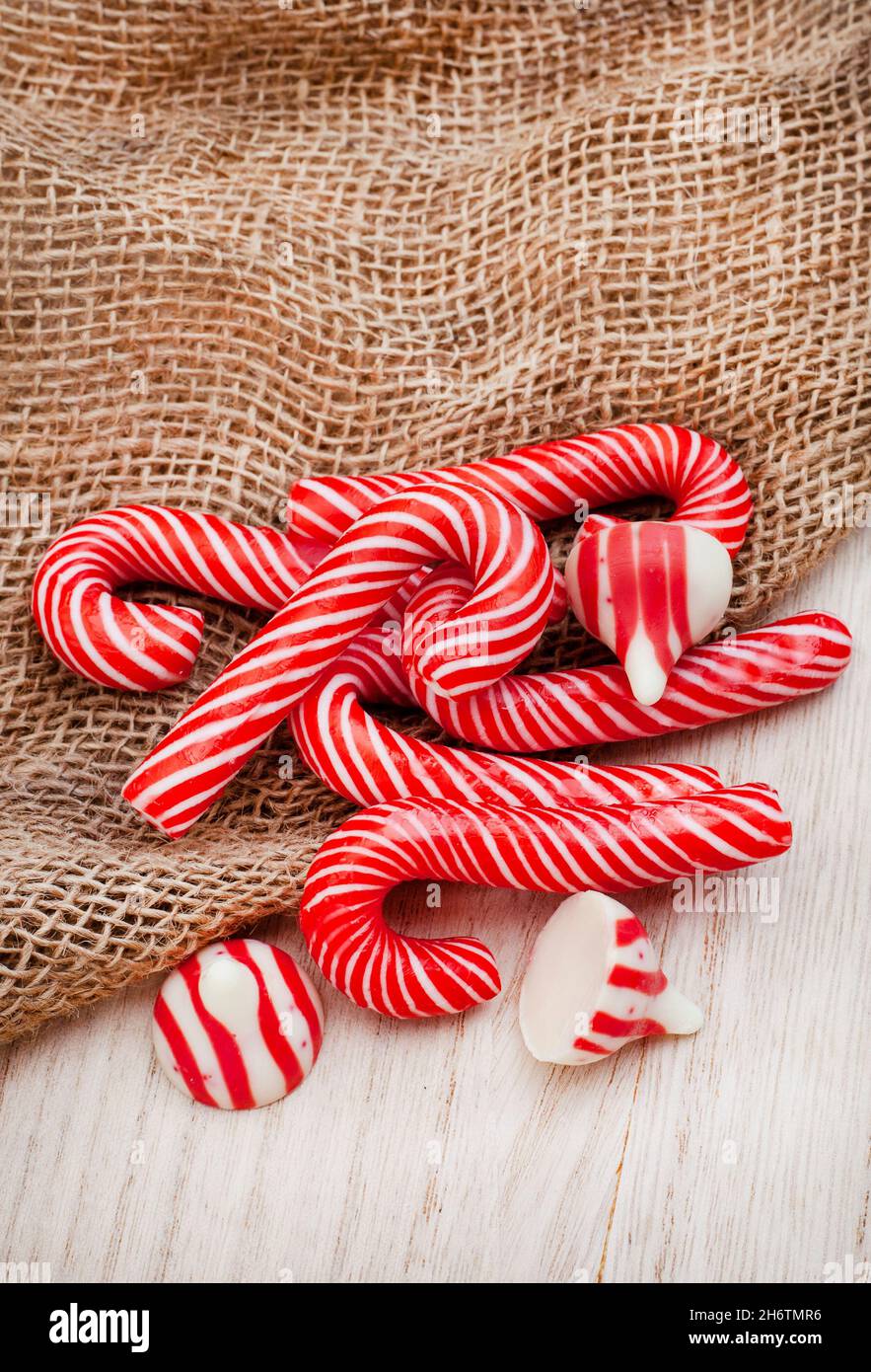 small candy canes and red and white sweets with copy space Stock Photo ...