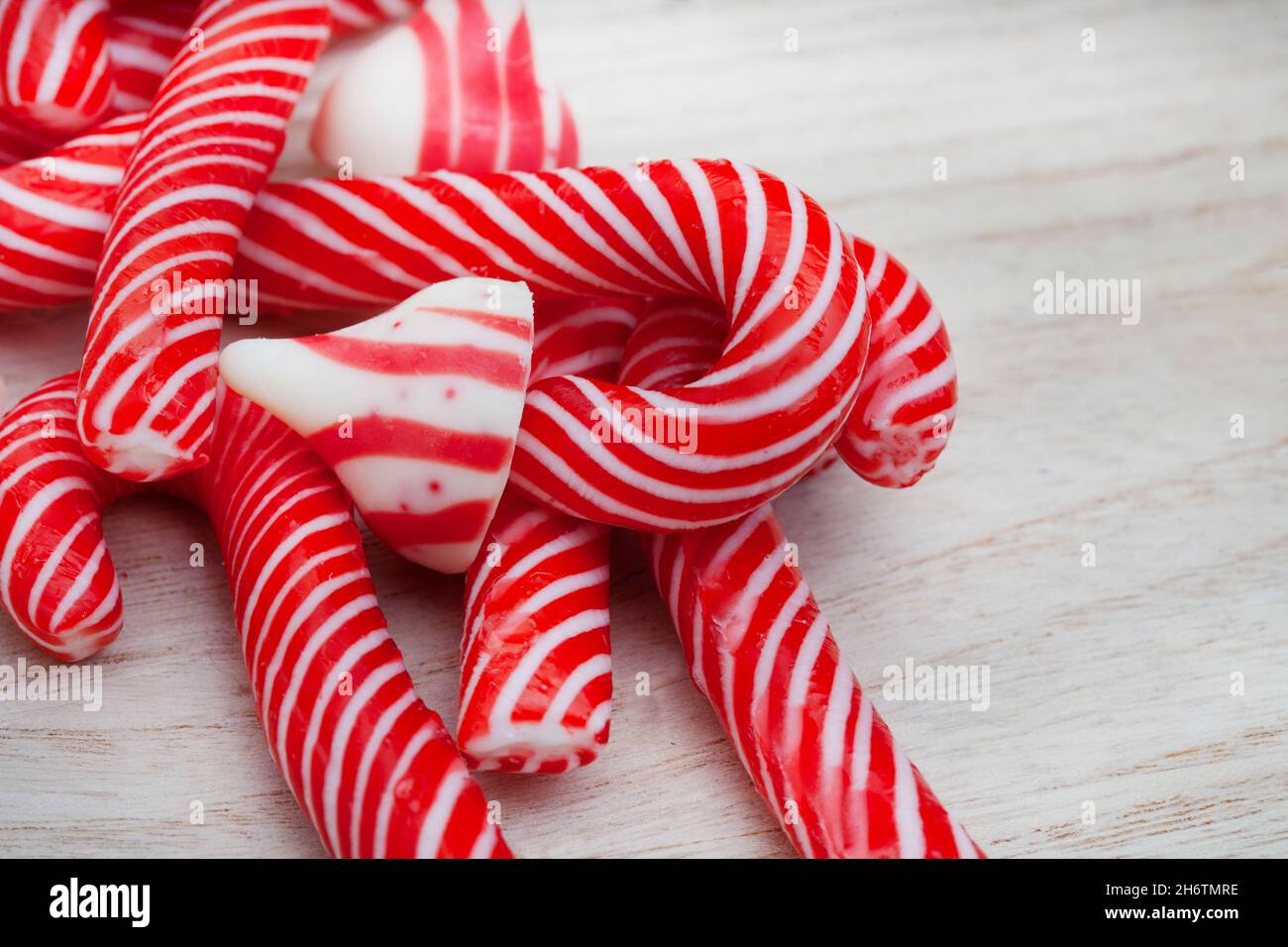 small candy canes and red and white sweets with copy space Stock Photo ...