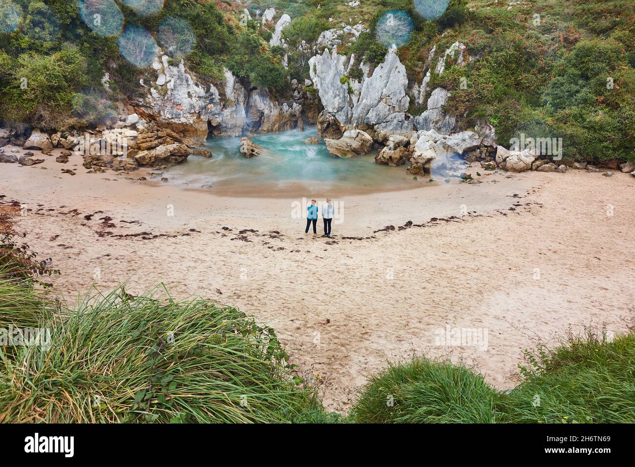 Picturesque inlet sand and rocky beach in Asturias, Gulpiyuri. Spain ...
