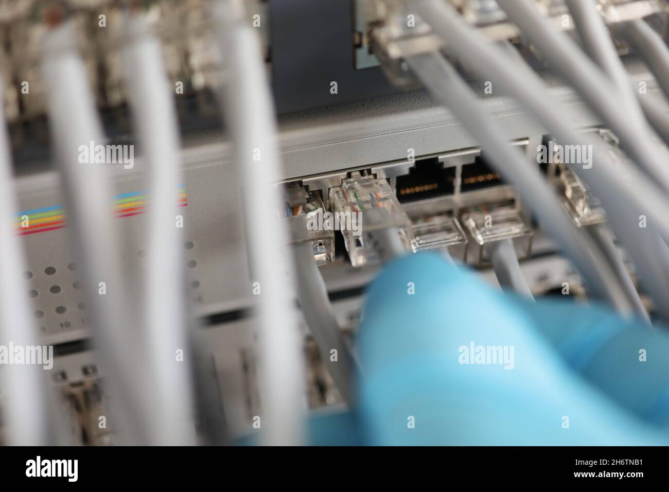 Ethernet cable hand hi-res stock photography and images - Alamy