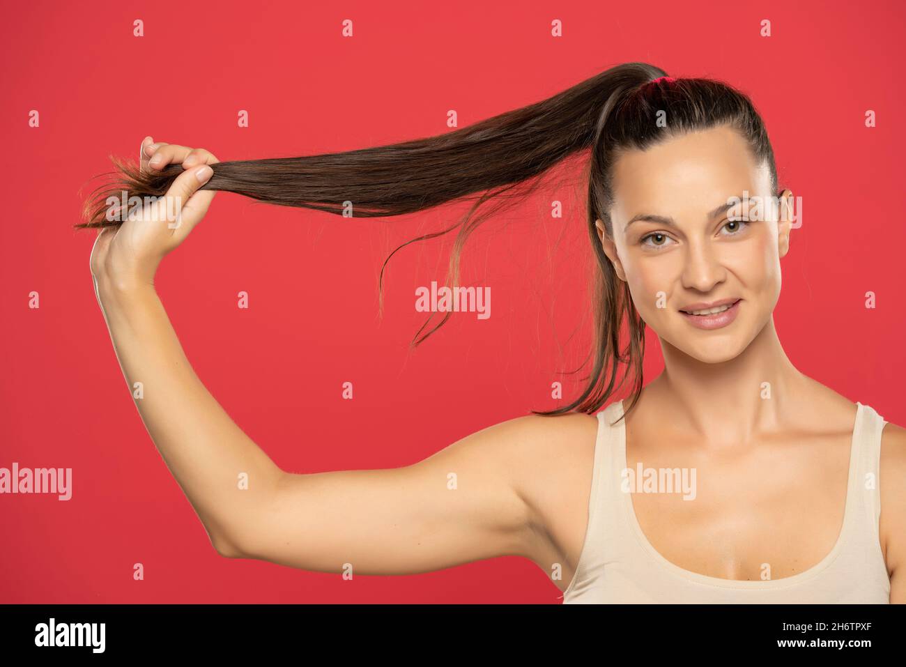 Woman brown hair ponytail headshot hi-res stock photography and images ...