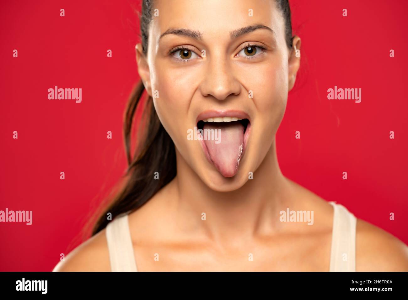 Face close up tongue hi-res stock photography and images - Alamy