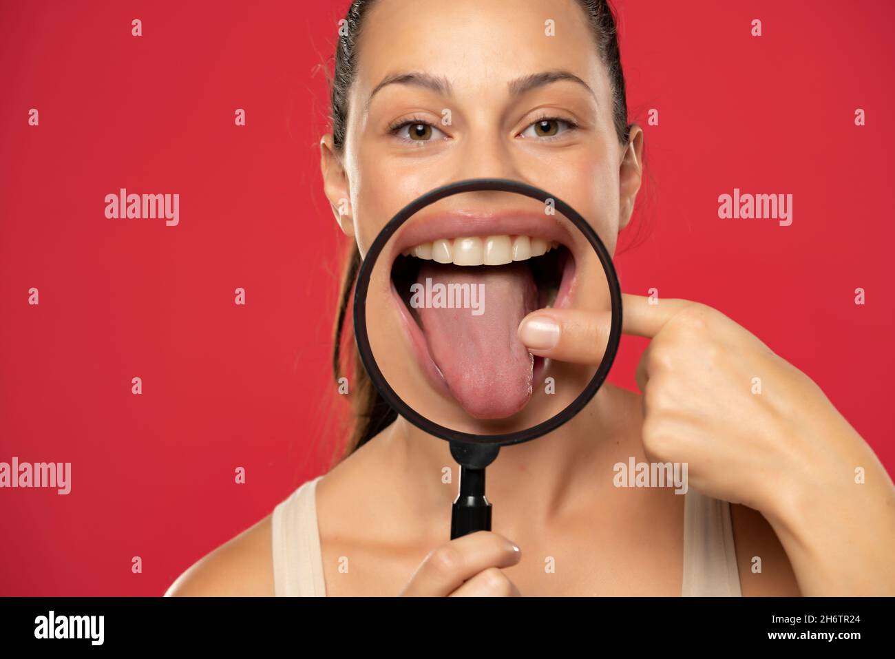 Woman open mouth tongue close up hi-res stock photography and images ...