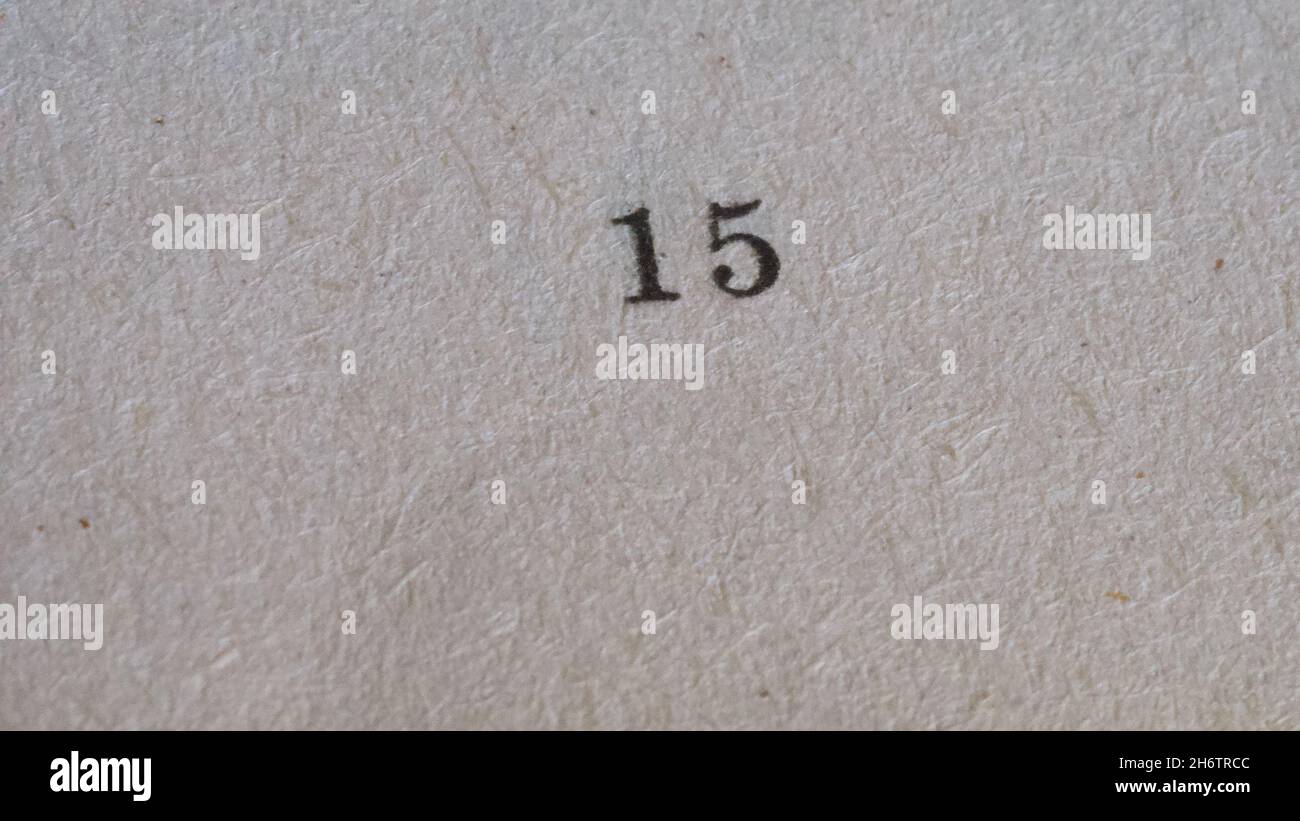 The number 15 printed on a piece of paper. Paper texture Stock Photo ...