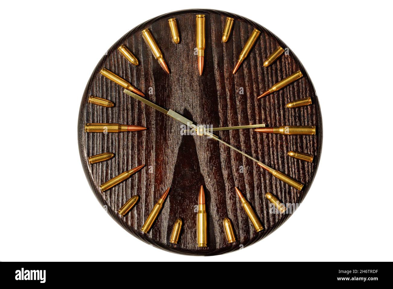 Round wall clock made of solid wood with cartridges and bullets in a ...