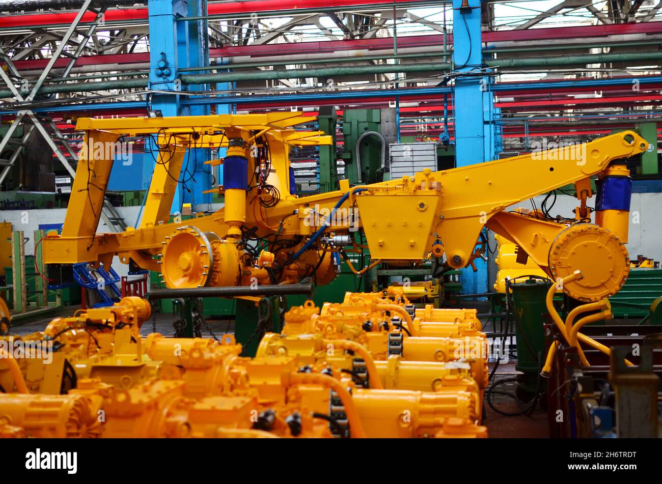 Production process of heavy mining trucks at the factory. Dump truck on ...