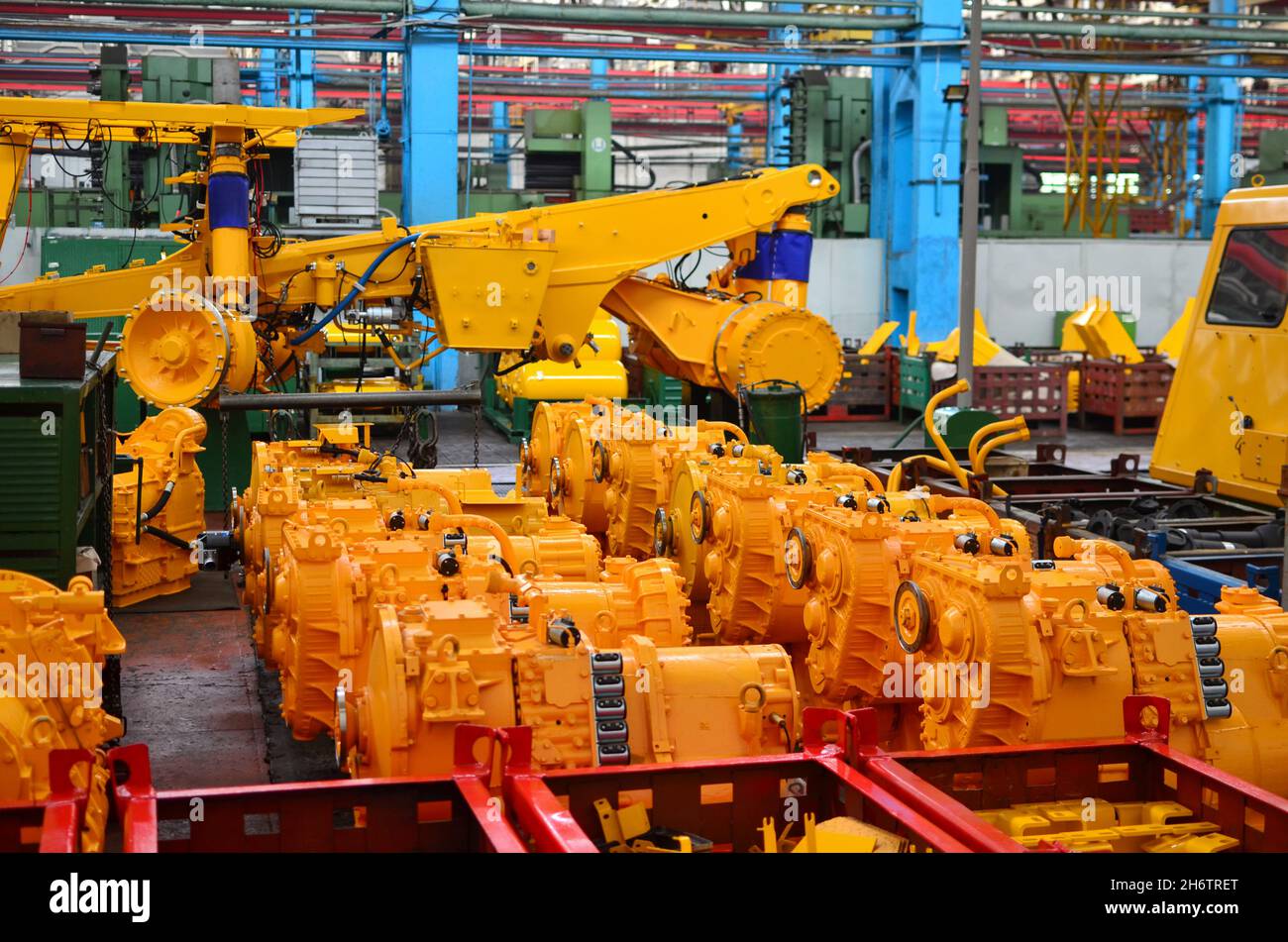 Production process of heavy mining trucks at the factory. Dump truck on ...