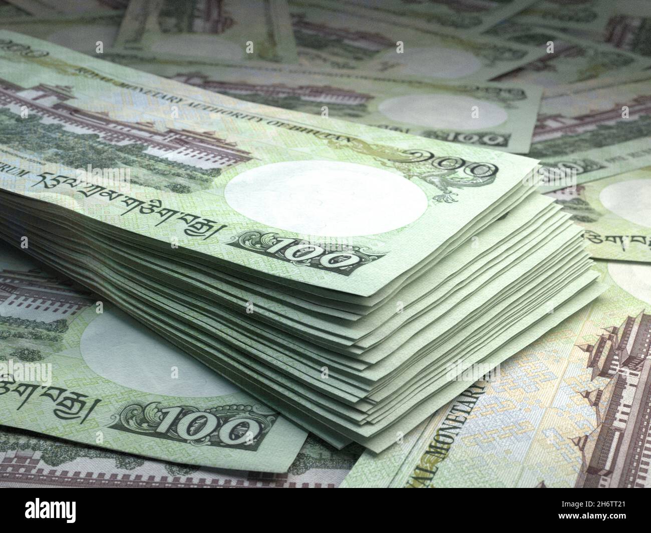 Money of Bhutan. Ngultrum bills. BTN banknotes. 100 Dzongkha. Business ...