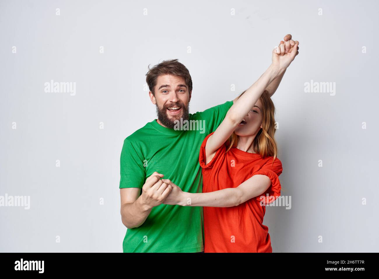 married couple hug friendship colorful t-shirts family isolated ...