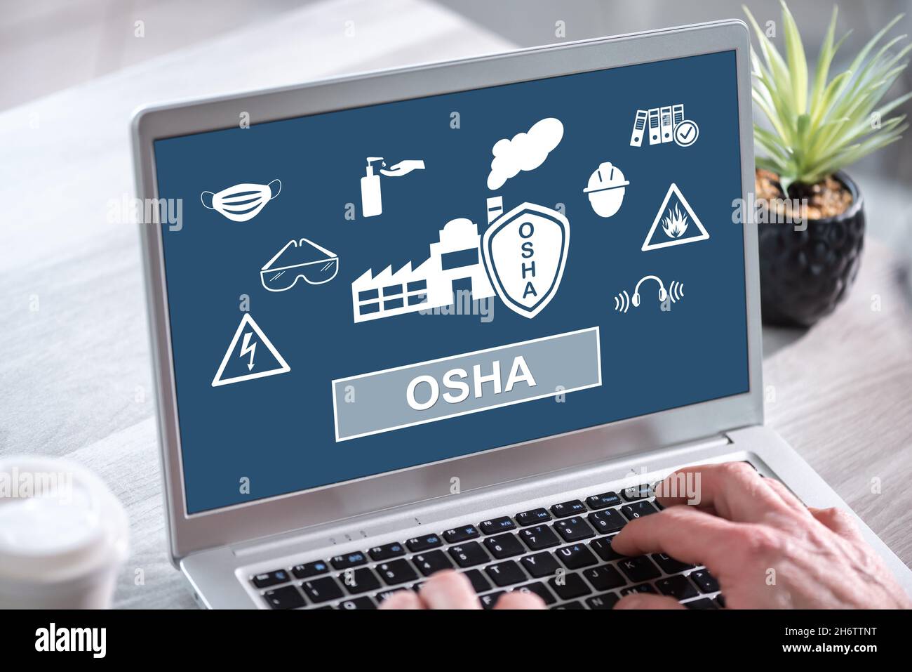 Laptop screen displaying an osha concept Stock Photo - Alamy