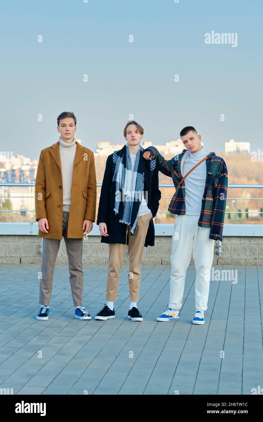 Three men posing hi-res stock photography and images - Alamy