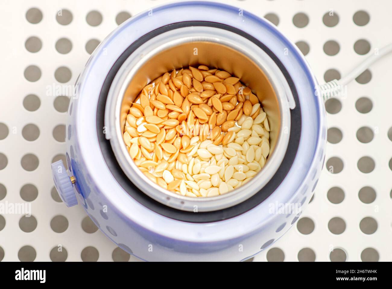 Waxing granules hi-res stock photography and images - Alamy