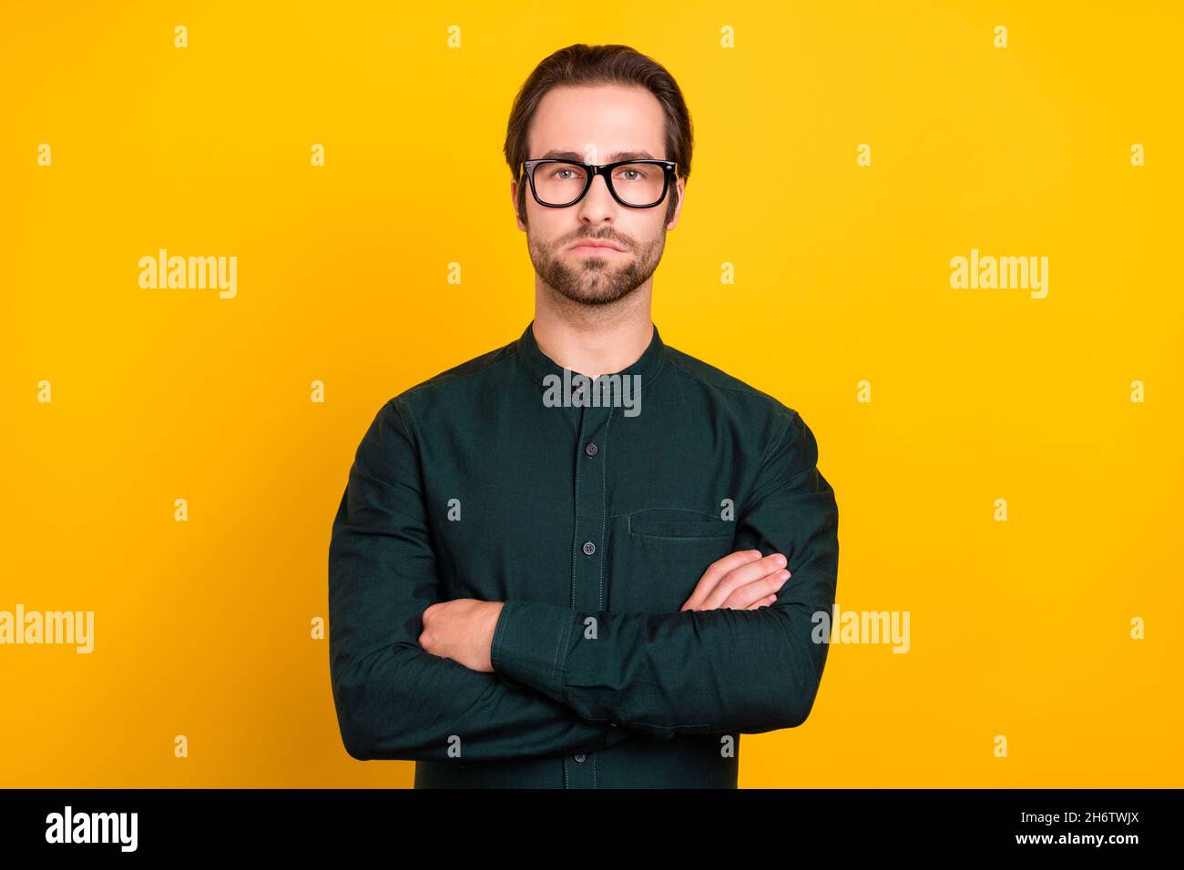 Photo of serious confident young guy dressed smart casual clothes ...