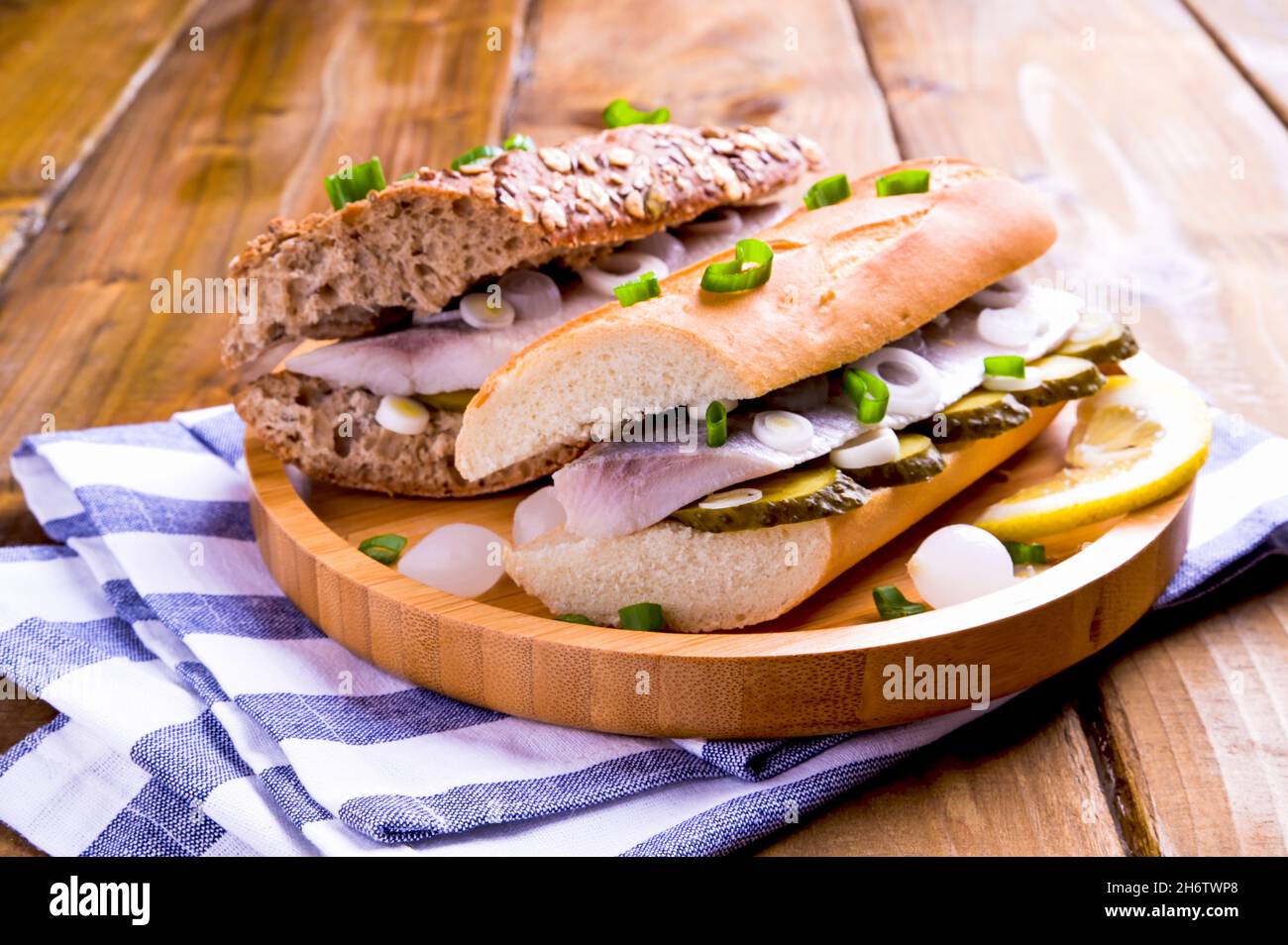 Dutch herring. Toast with Dutch herring, onions, pickles. Traditional ...