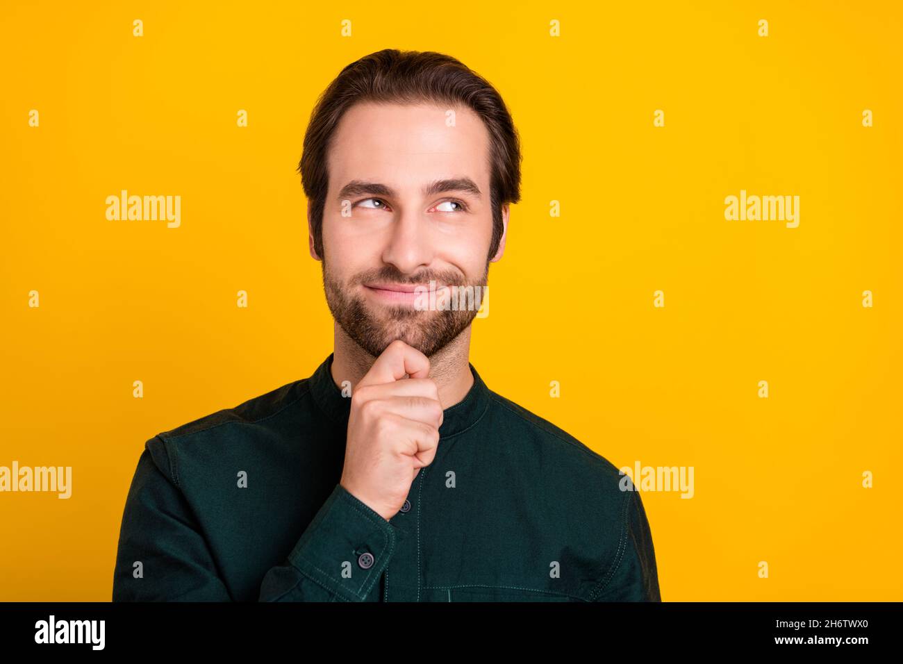 Photo of nice young guy hand face look empty space wear green shirt ...