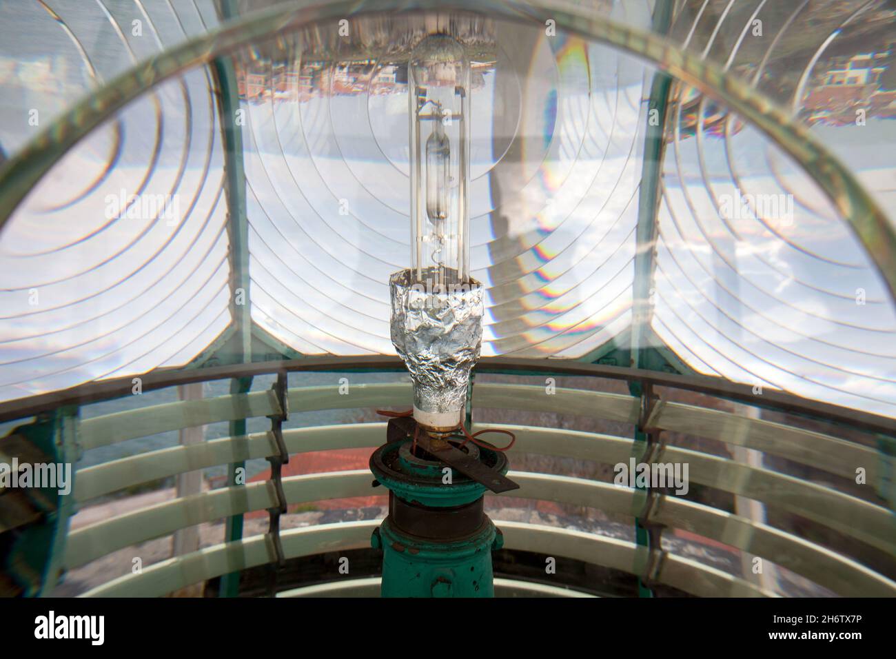 The big lens and lamp of the lighthouse.Sile lighthouse interior Stock ...
