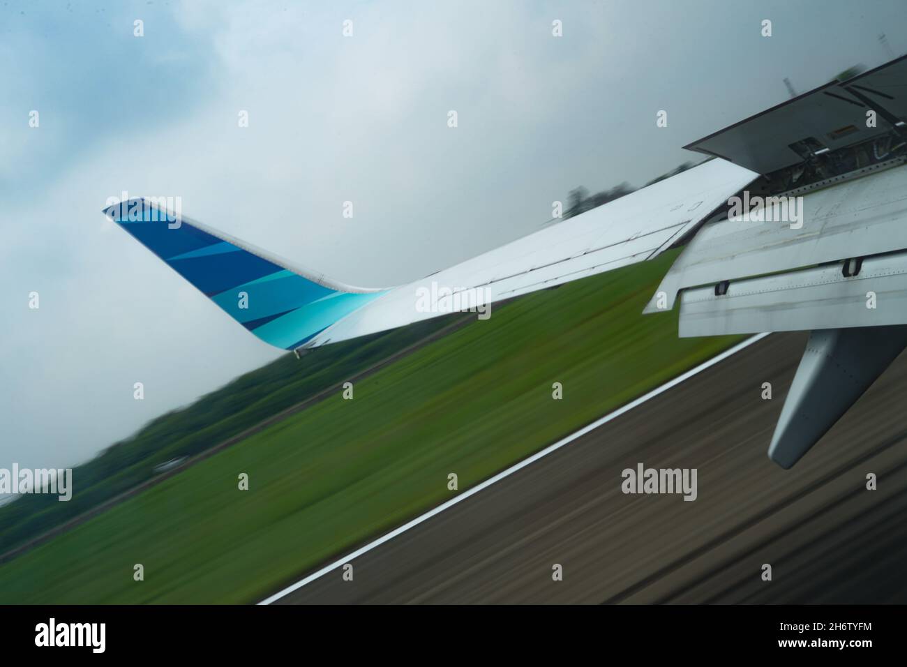 Wing of Garuda Indonesia Airline Stock Photo - Alamy