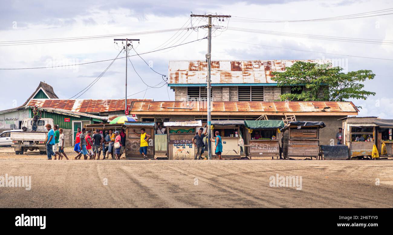 AUKI, SOLOMON ISLANDS - Dec 12, 2016: A row of street-side stalls ...