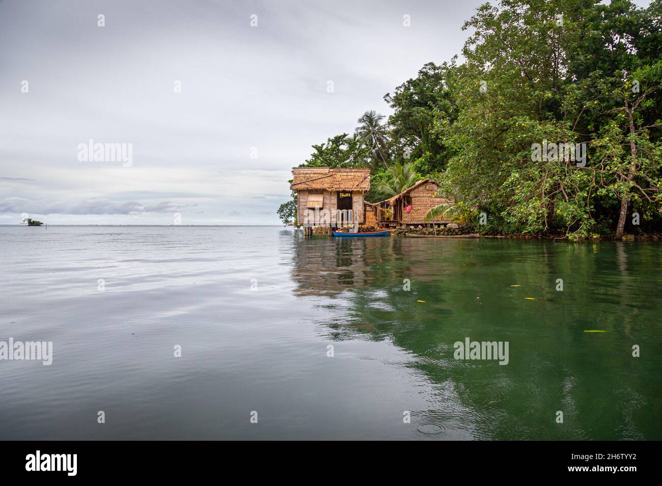 Traditional house built over the water in the Solomon Islands Stock ...