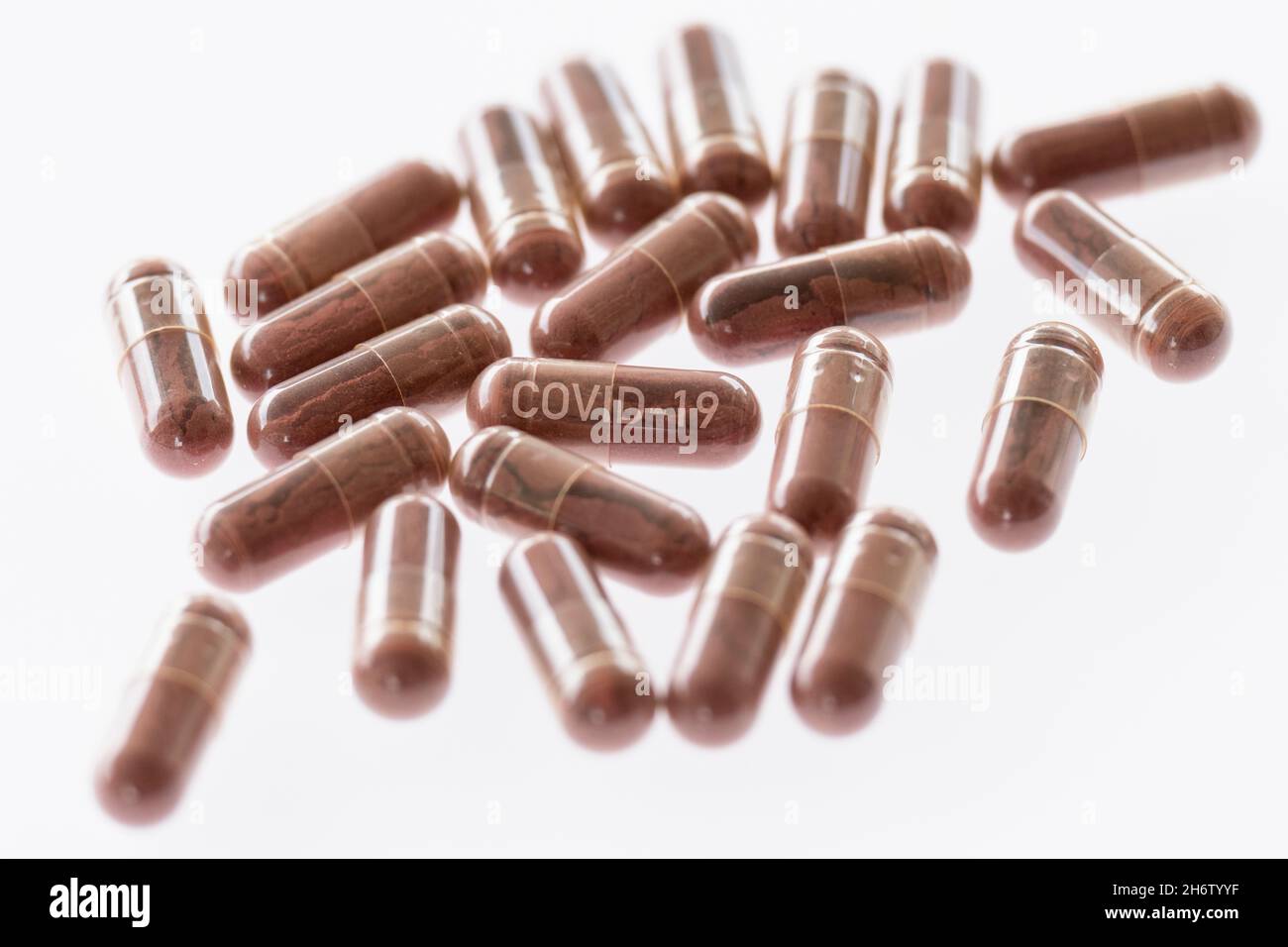 (Selective focus) Covid-19 pills on a white background. Concept of the ...