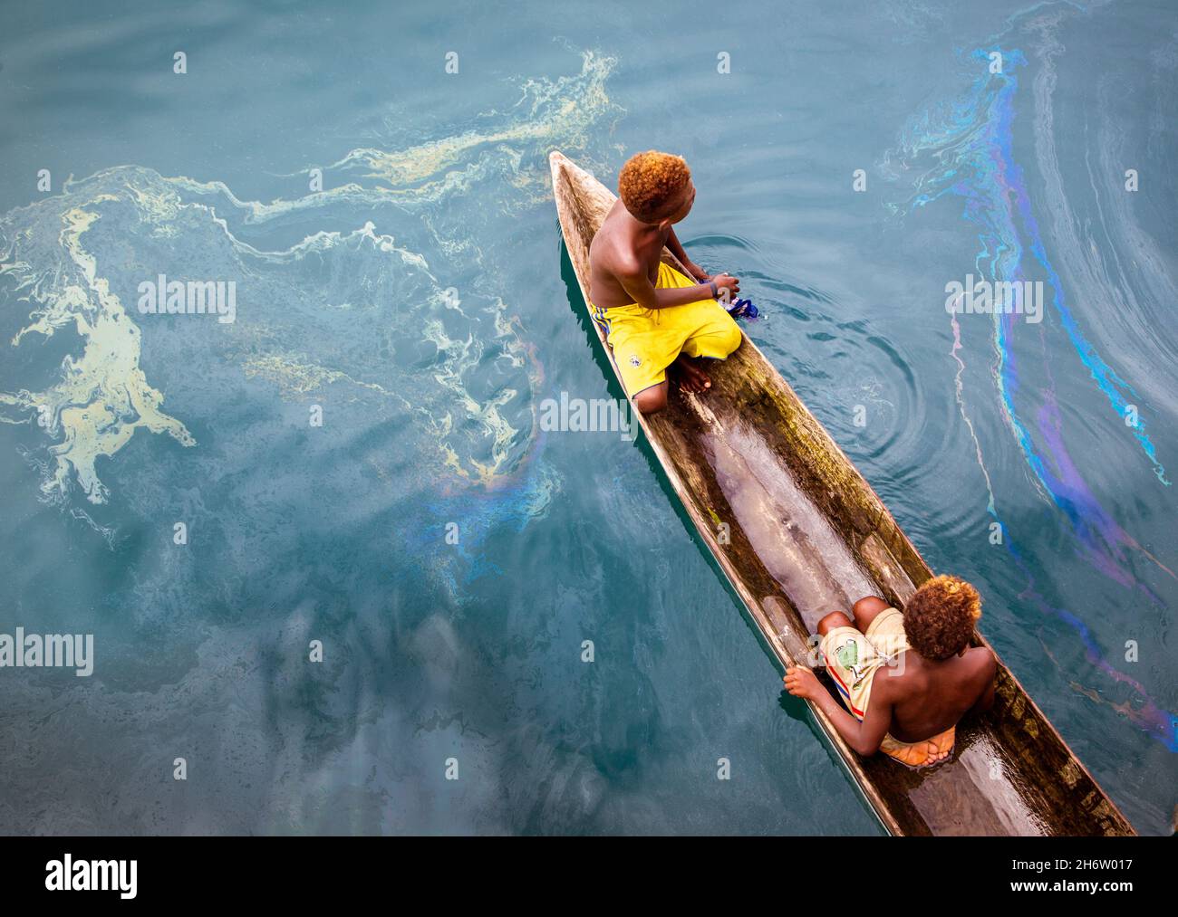 AUKI, SOLOMON ISLANDS - Dec 12, 2016: An oil slick on the waters on ...
