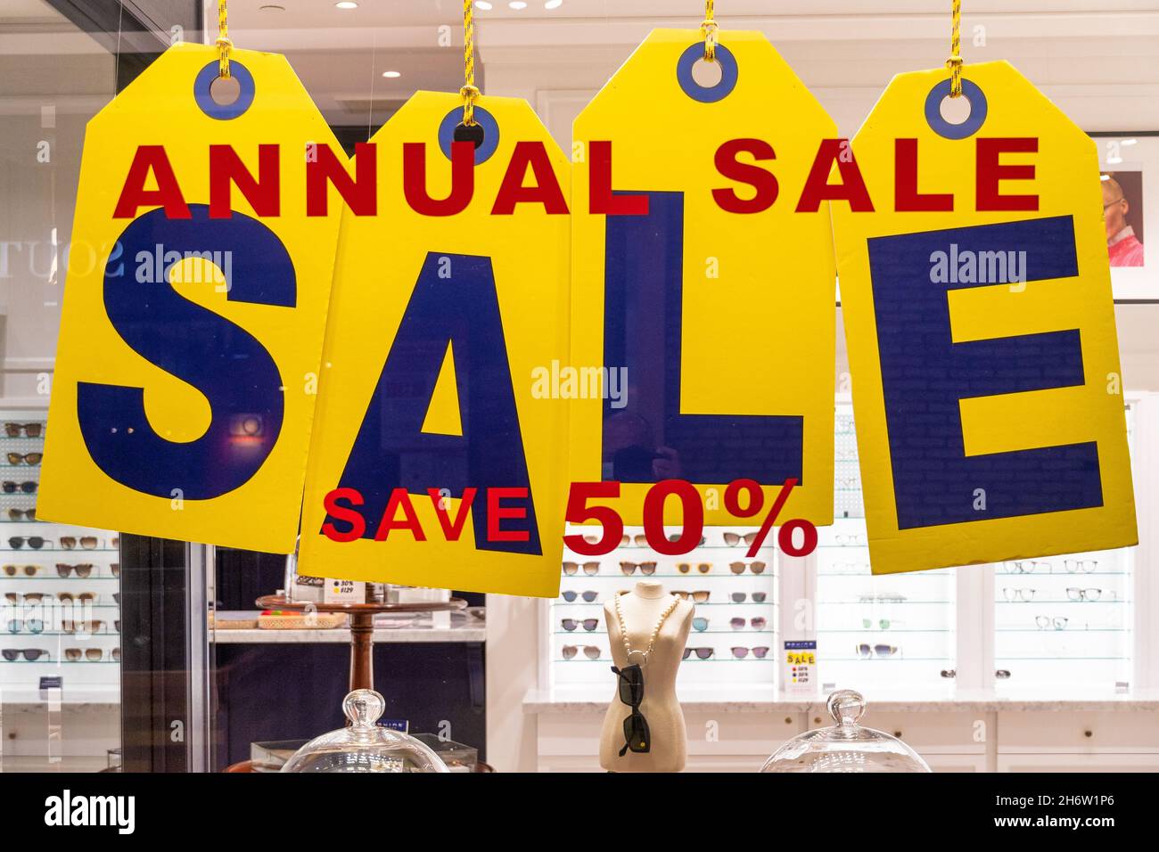 Sign announcing an annual sale with a 50% discount.Nov. 18, 2021 Stock ...