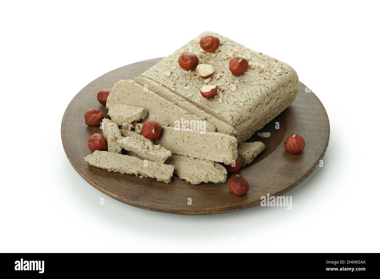 Concept of tasty food with halva isolated on white background Stock Photo - Alamy