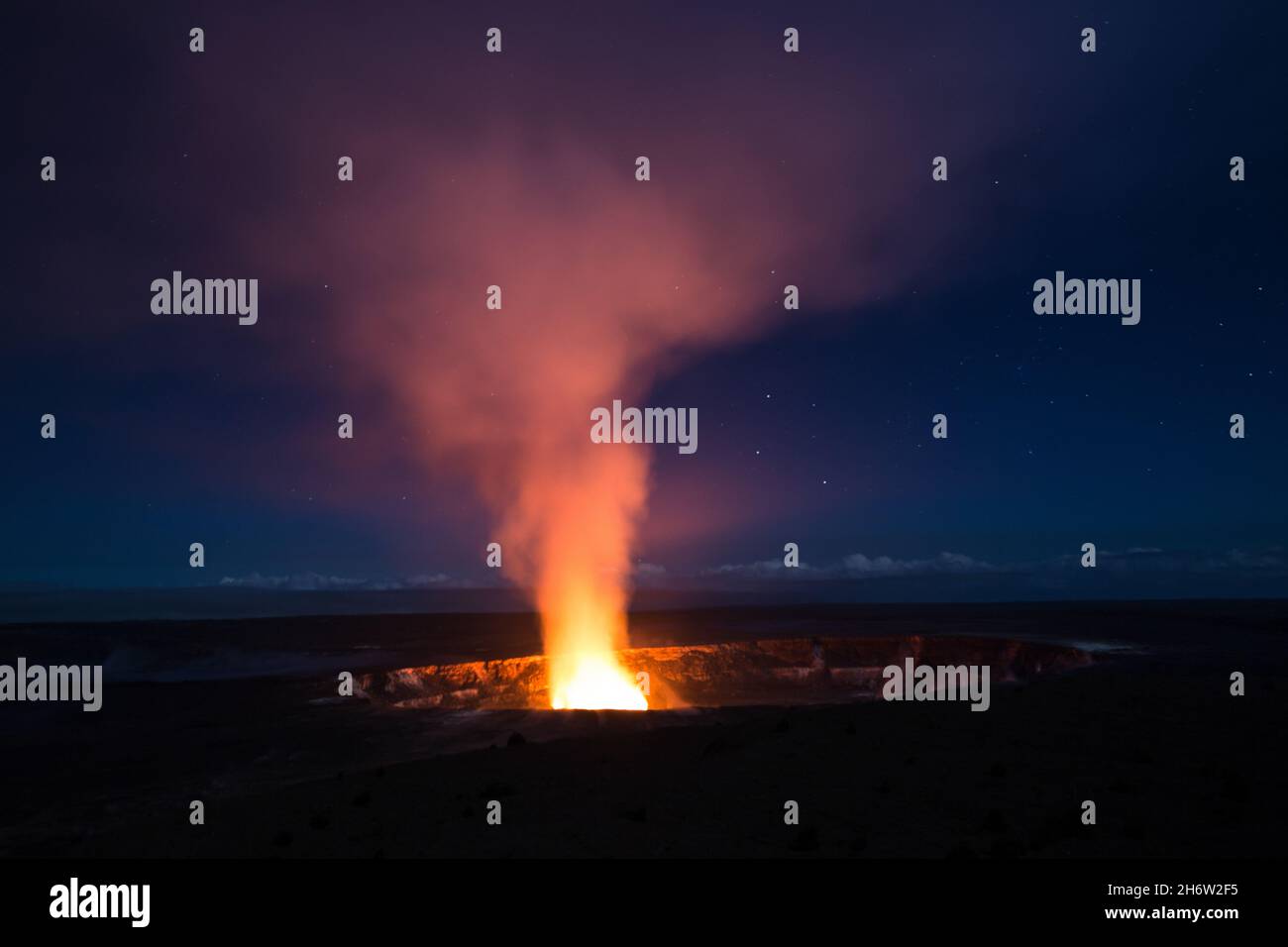 View of the flame coming from the volcano at night Stock Photo - Alamy