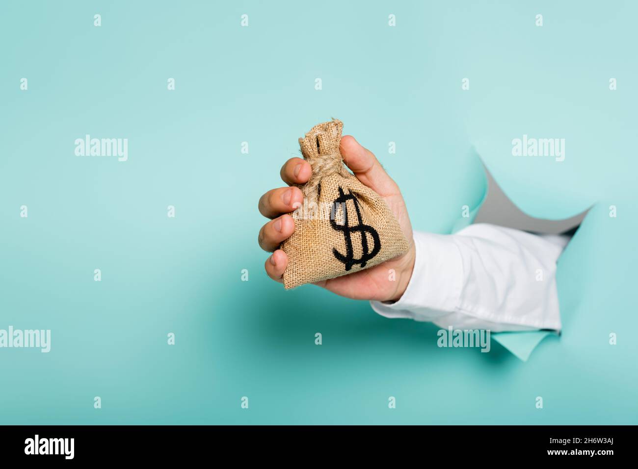 Ripped money sack hi-res stock photography and images - Alamy