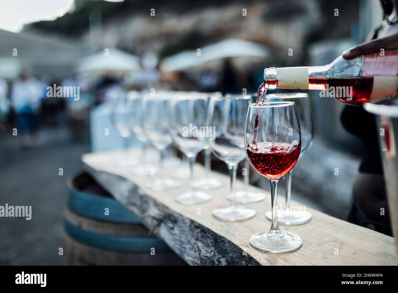 POURING RED WINE AT SOCIAL EVENT LIFE WEDDING PARTY OR OTHER LUXURY ...