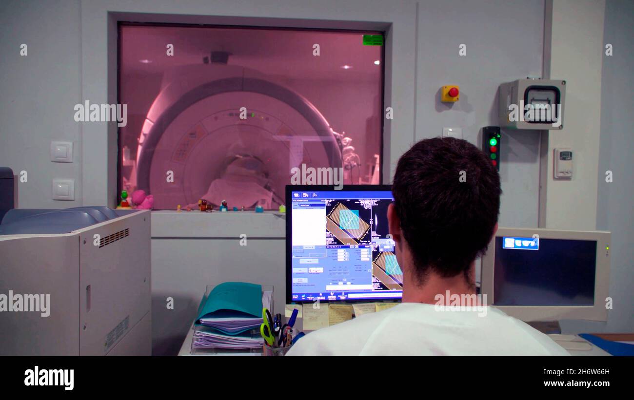 close-up of a doctor or radigraphy technician looking at an image on ...