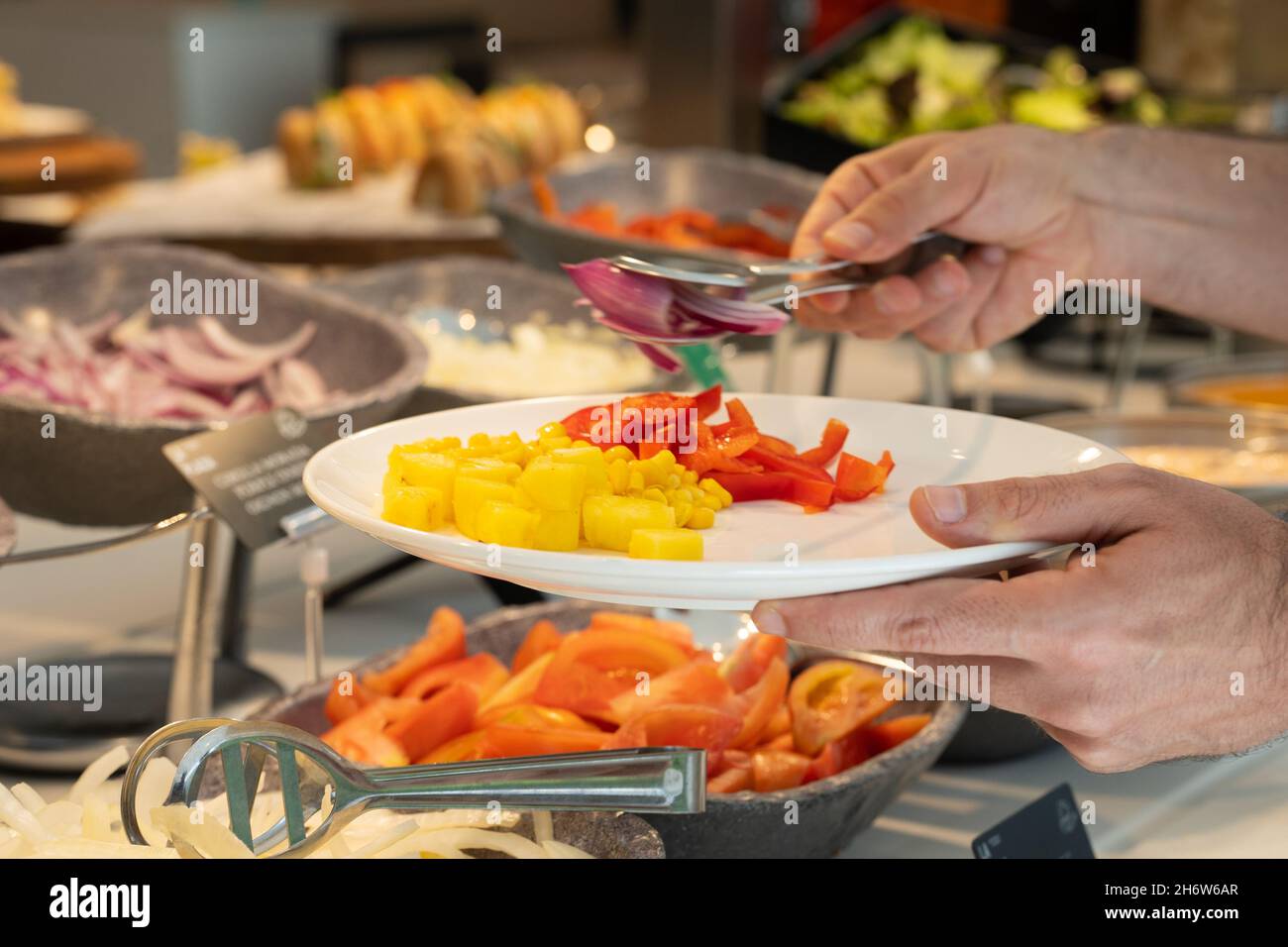 men helping himself to food at the hotel buffet Stock Photo - Alamy
