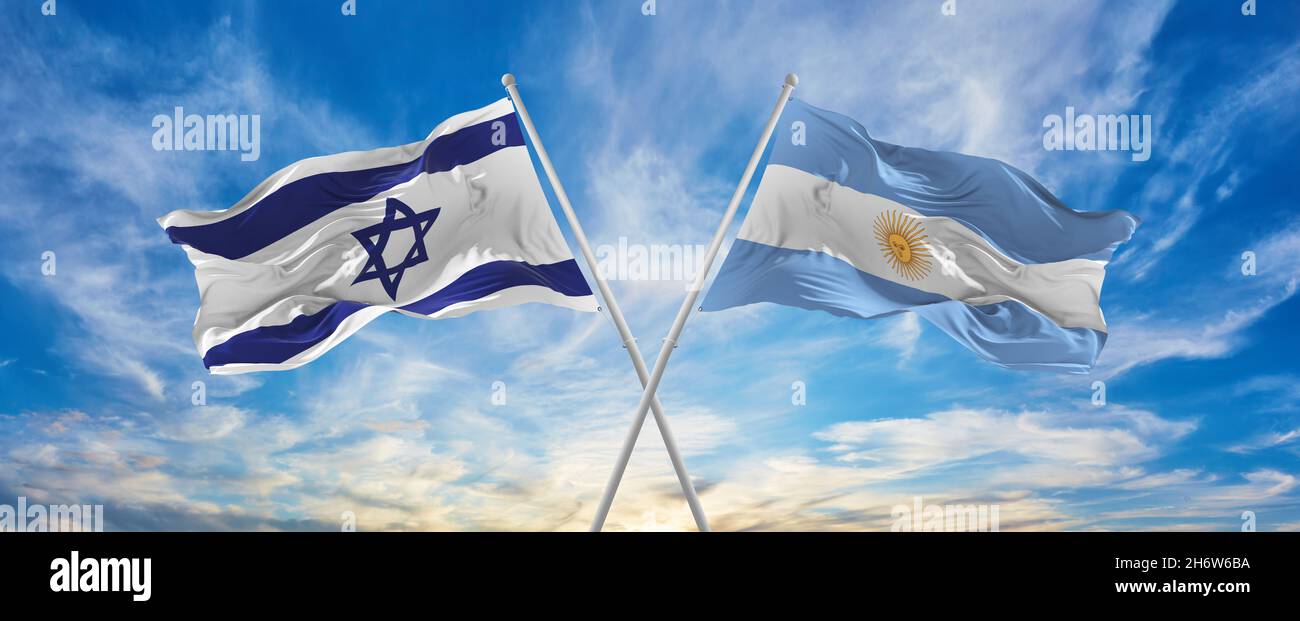 crossed national flags of Israel and Argentina flag waving in the wind ...