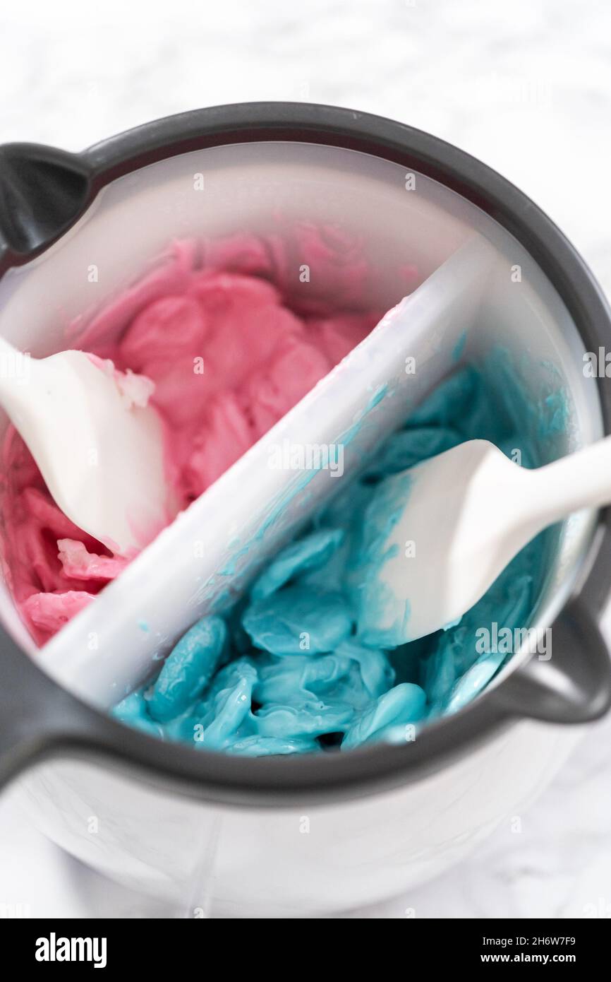 Melting chocolate melts in a candy melting pot to prepare mermaid tails ...