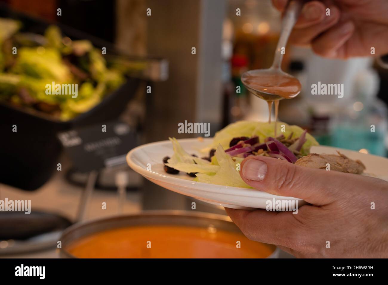 men helping himself to food at the hotel buffet Stock Photo - Alamy