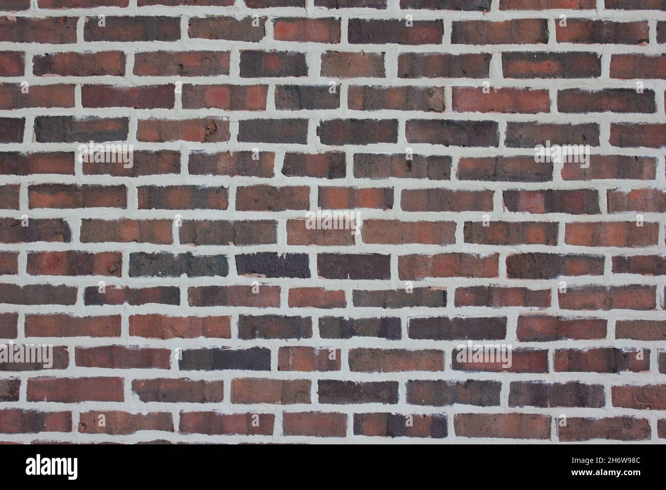 Typical common red brick wall Stock Photo - Alamy