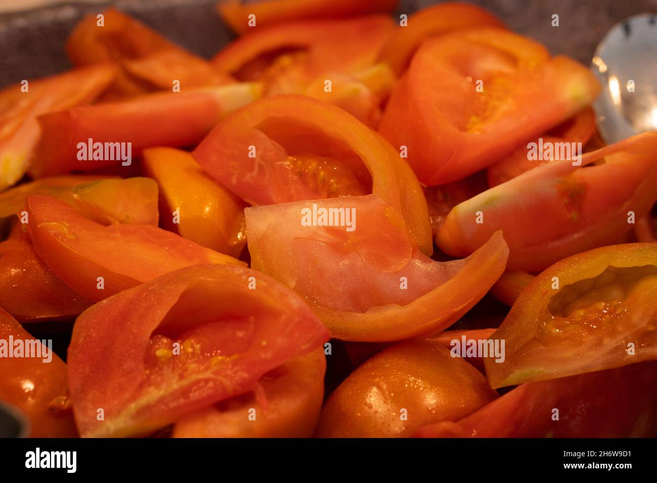 Salad buffet in the restaurant. Bowl with pieces of tomatoes Stock ...