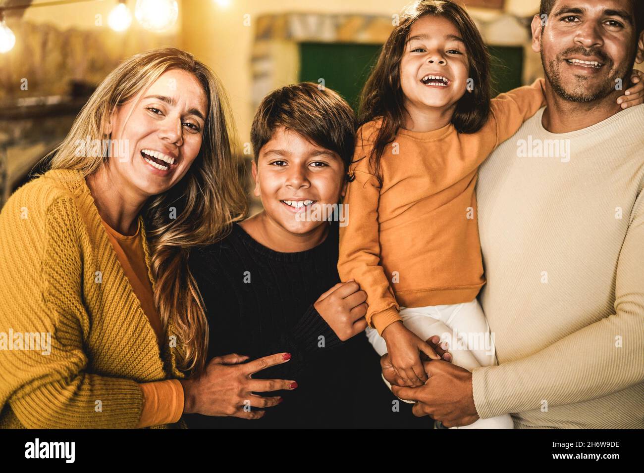 Portrait of latin family smiling on camera - Focus on boy face Stock ...