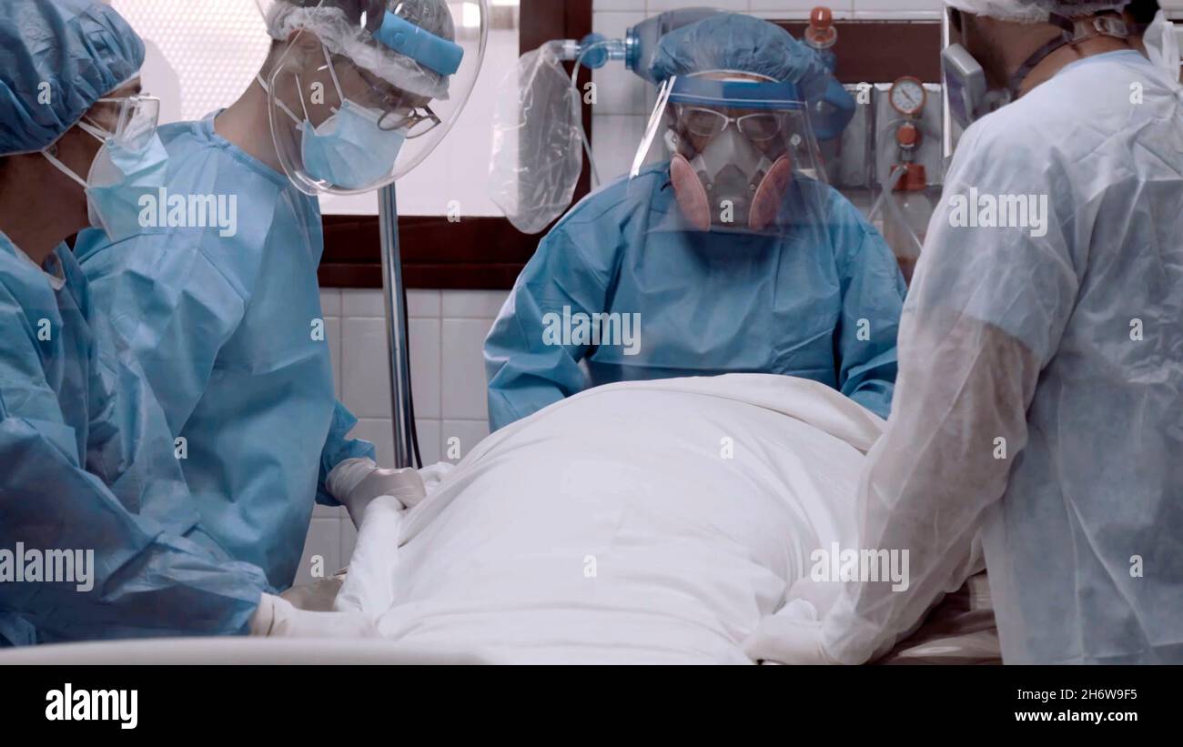 Transferring patient hospital bed hi-res stock photography and images ...