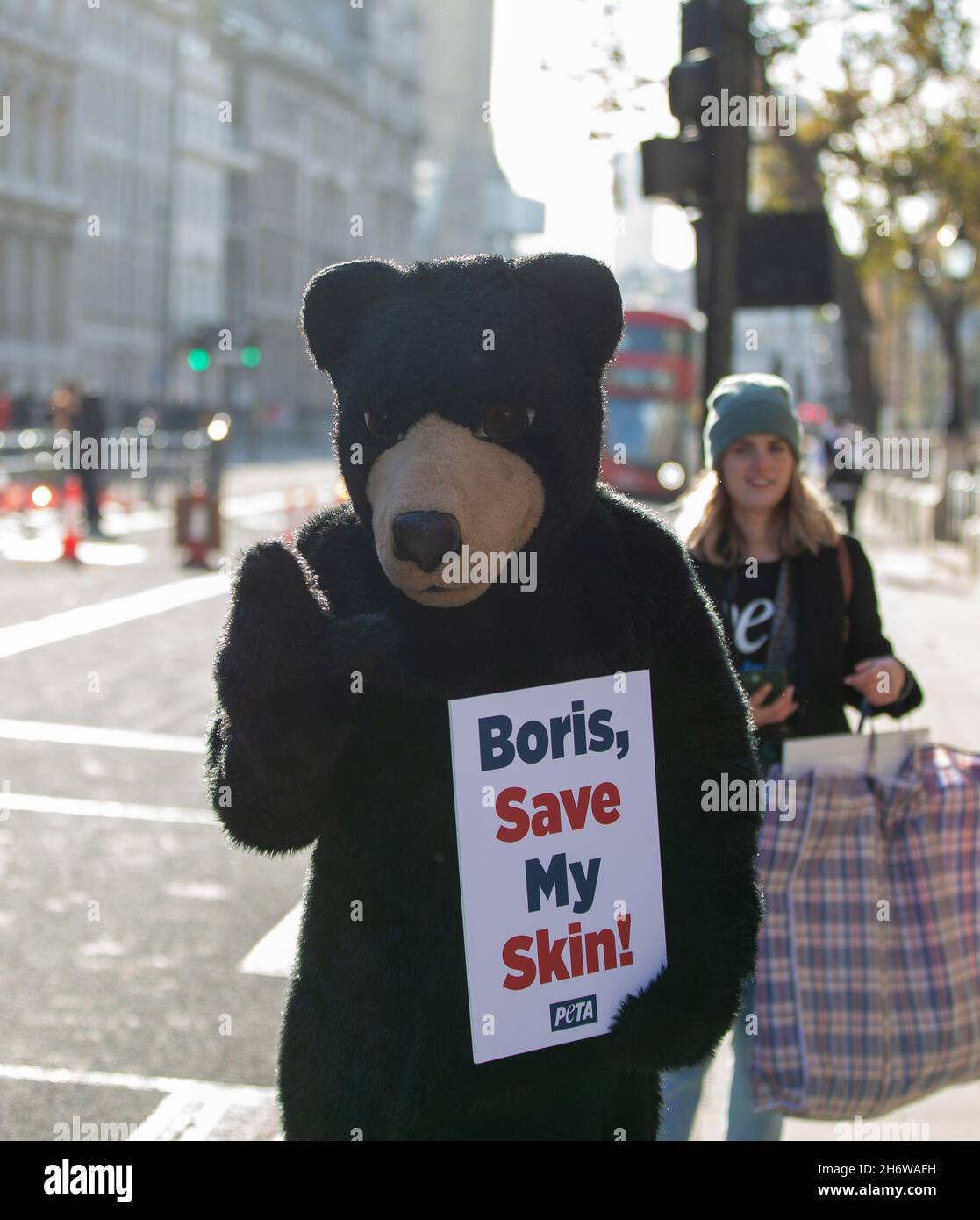 London, England, UK. 18th Nov, 2021. PETA activist dressed as a bear ...