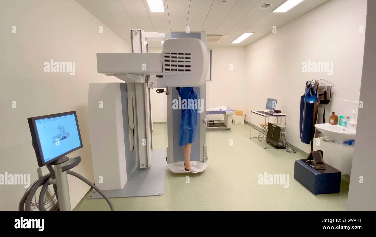 close-up of a female patient inside a CT scanner taking a body x-ray ...