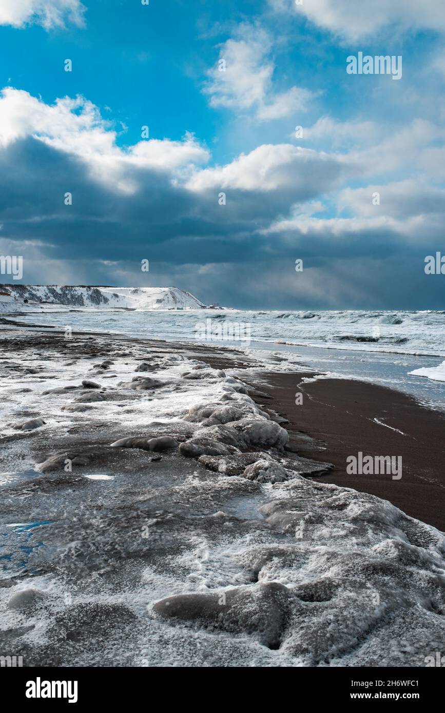 Winter landscape with frozen sea and icy beach. Dramatic seascape ...