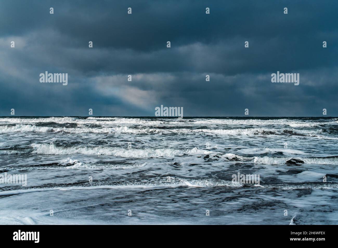 Winter landscape with frozen sea and icy beach. Dramatic seascape ...