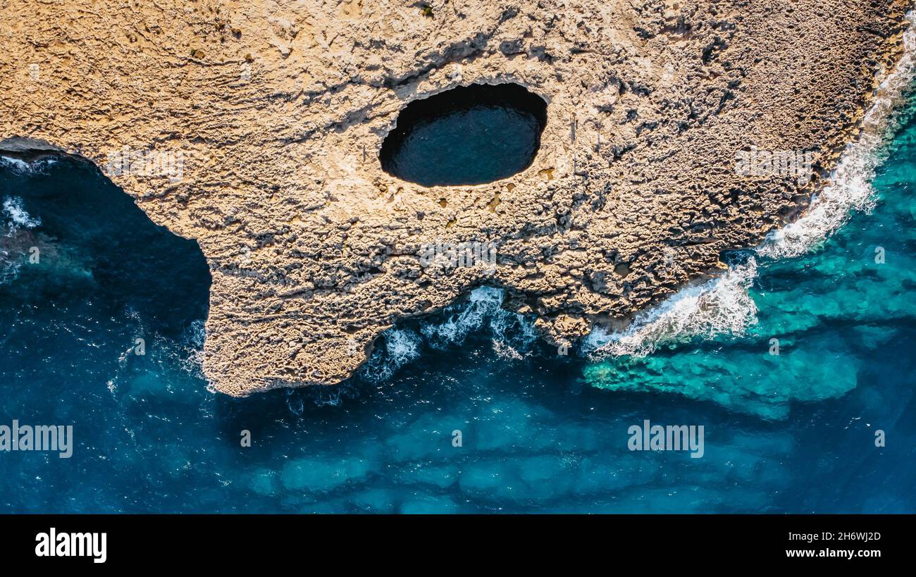 Lagoon inside rocky cave hi-res stock photography and images - Alamy