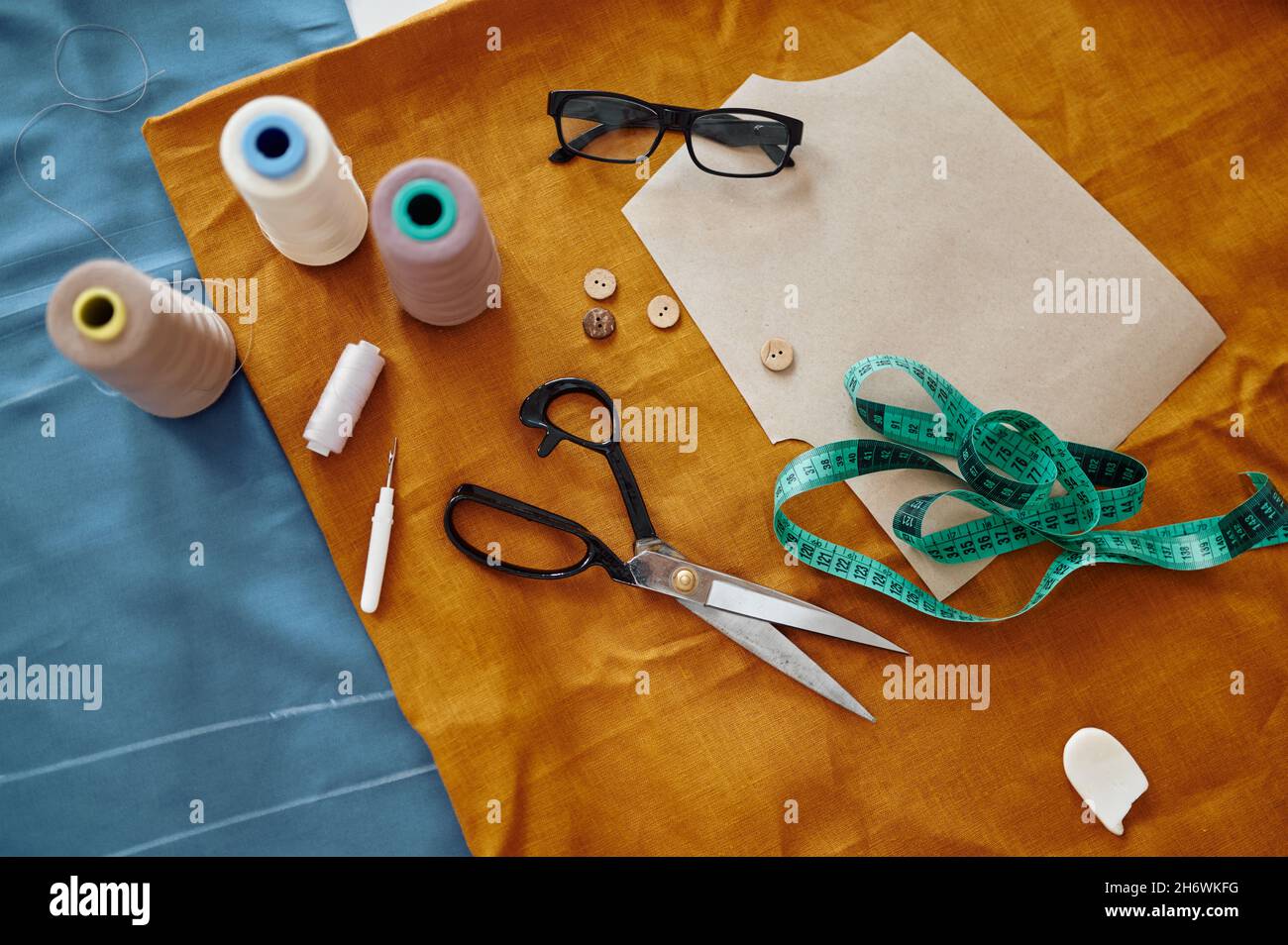 Dressmaking tools on the table, top view, nobody Stock Photo - Alamy