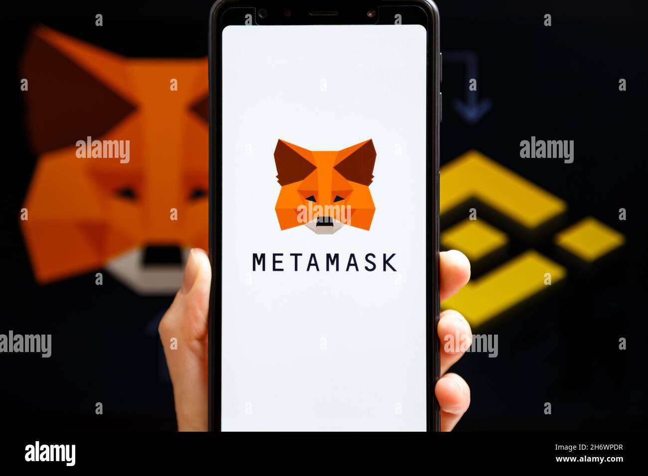 Ukraine, Odessa - October, 9 2021: Hand holding mobile with MetaMask ...